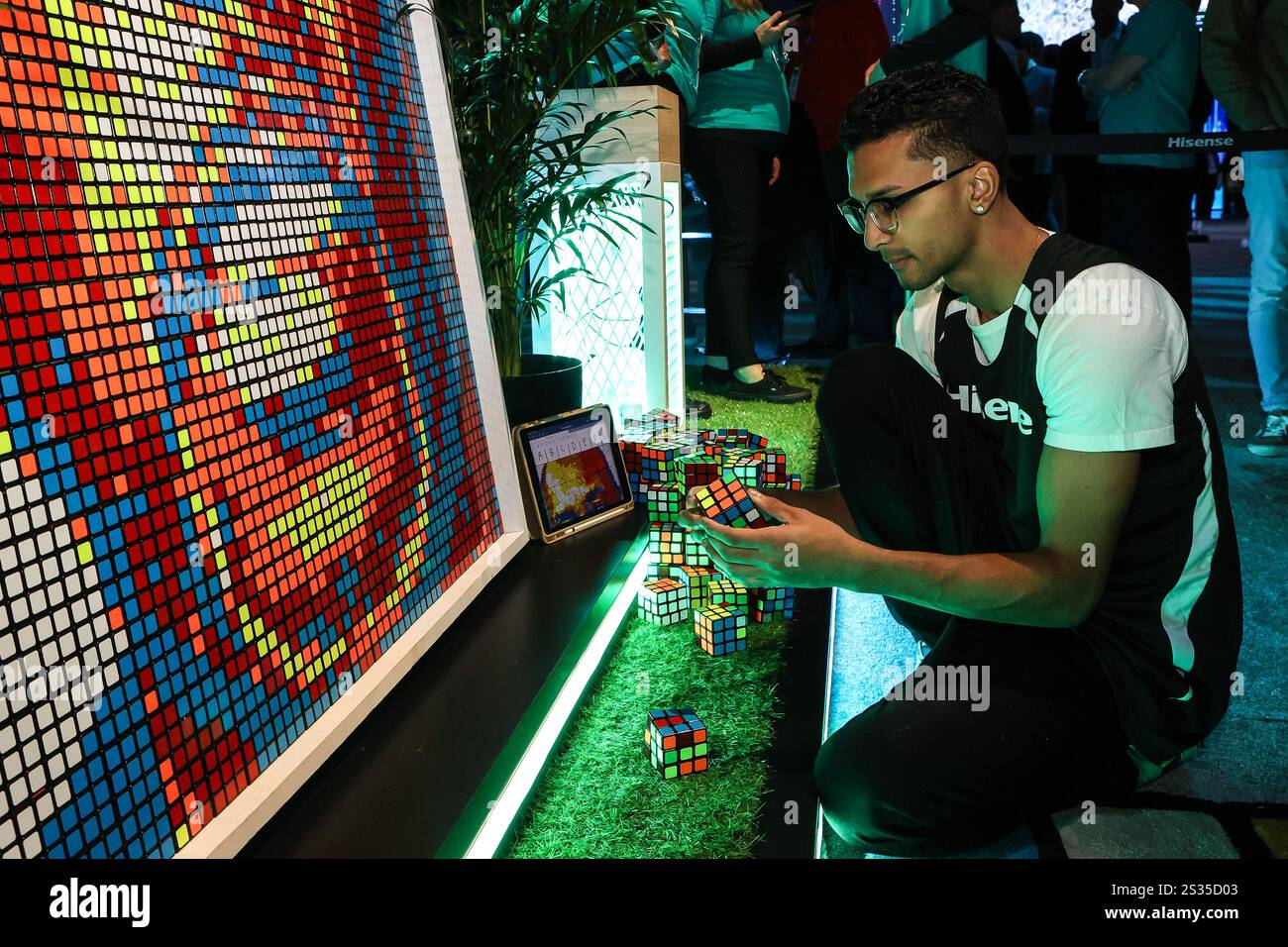 January 8, 2025: Dylan Sadiq (The College Cuber) creates a portrait of ...