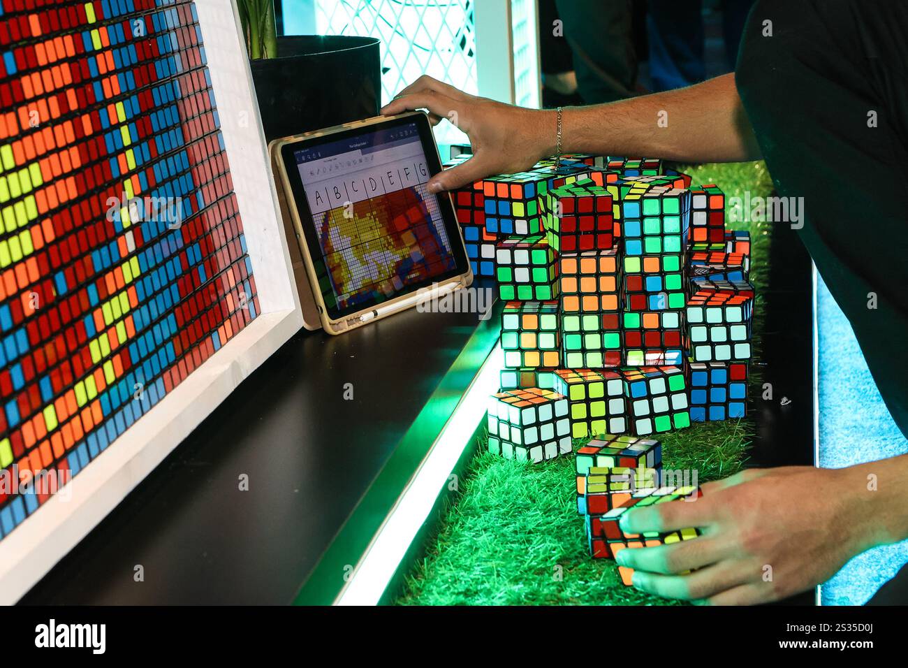 January 8, 2025: Dylan Sadiq (The College Cuber) creates a portrait of ...