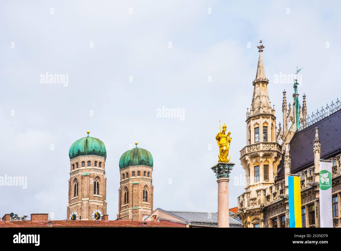 Munich, Marienplatz with town hall facade, Marian column and towers of ...