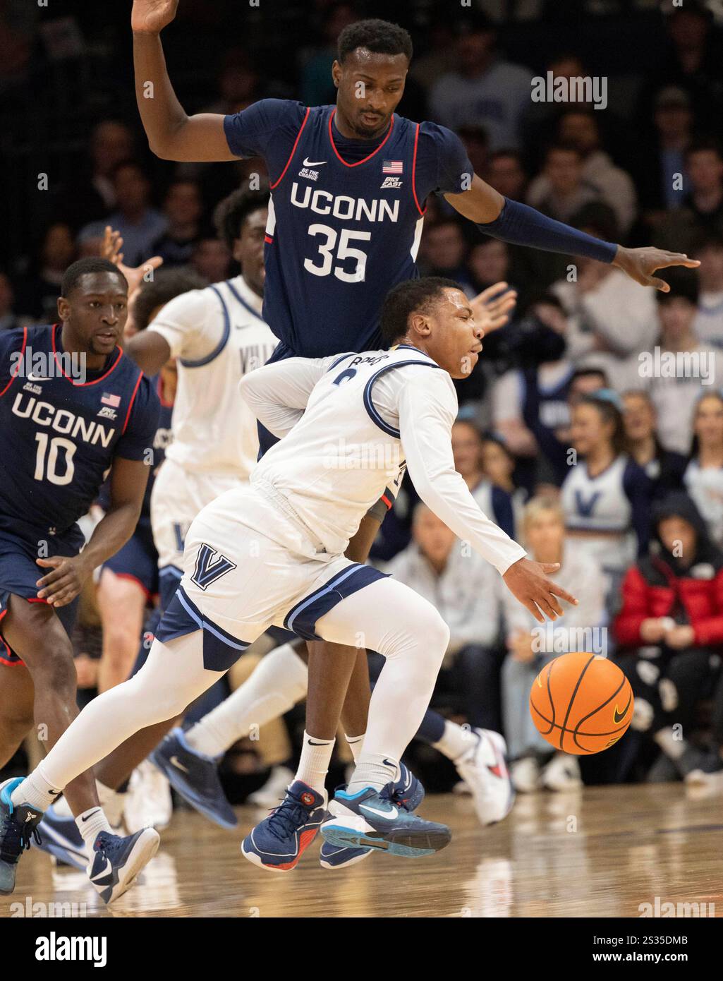 Villanova guard Jhamir Brickus (2) is fouled by Connecticut center ...