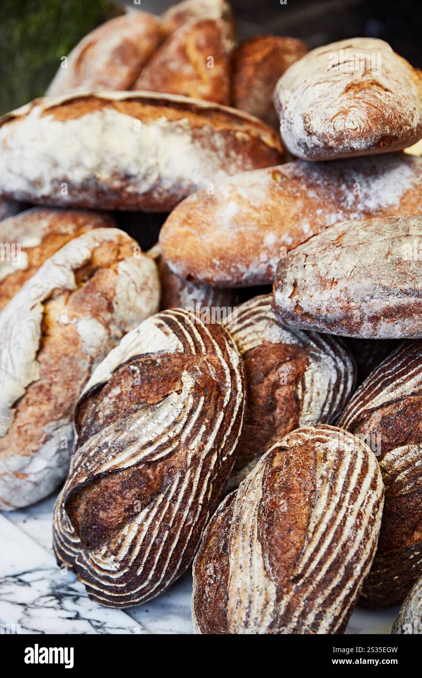 Different types of bread in a heap Stock Photo - Alamy