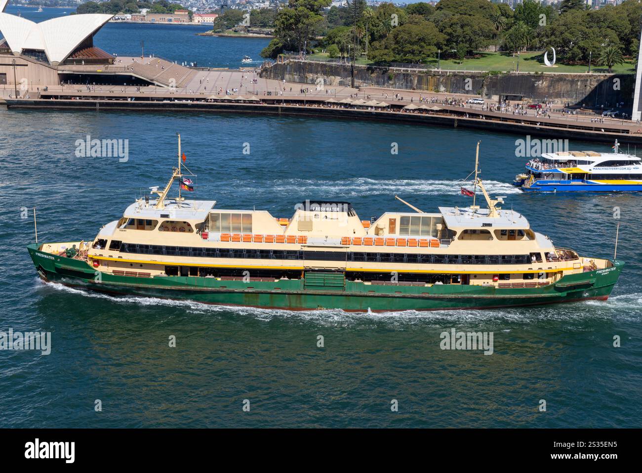 Sydney Freshwater class ferry on Sydney harbor passing the Sydney Opera ...