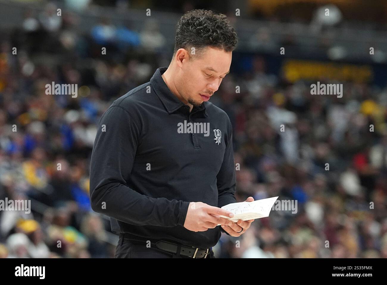 San Antonio Spurs interim head coach Mitch Johnson in the first half of ...