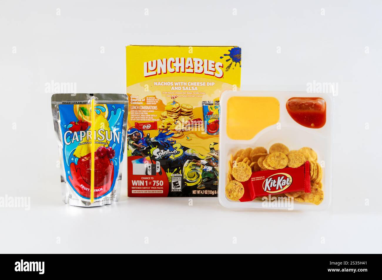 Colorful snack pack featuring nachos, cheese dip, salsa, and treats for ...