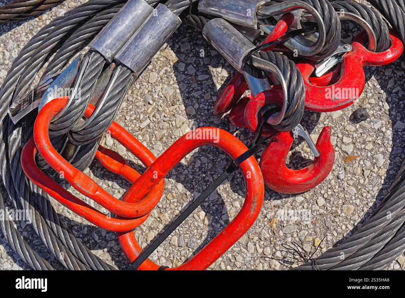 Hoist wire cables hooks and metal links set for heavy lifting Stock ...