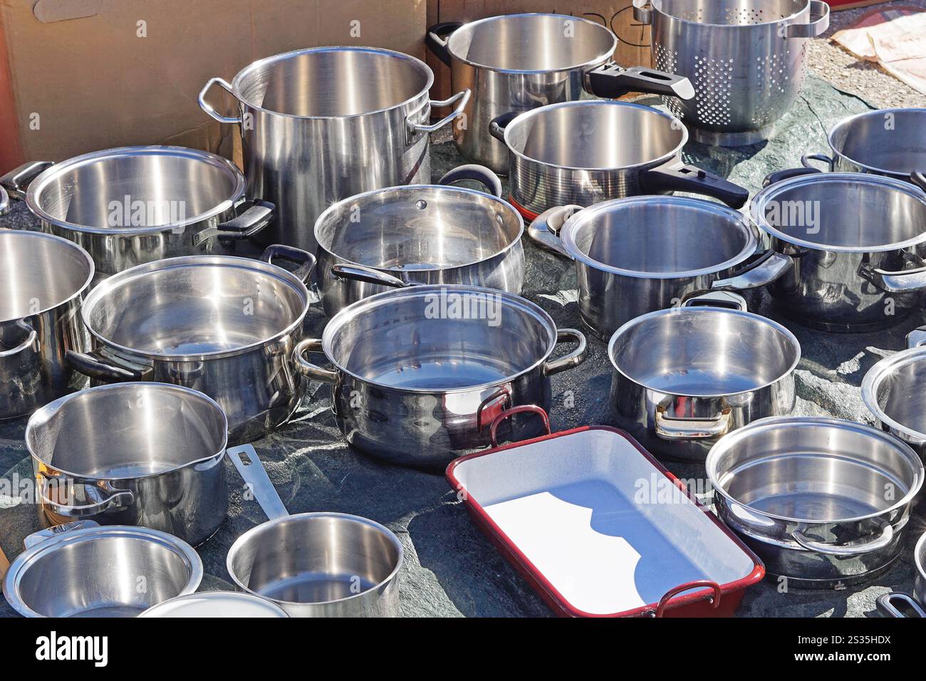 Many stainless steel metal cooking pots kitchen equipment Stock Photo ...