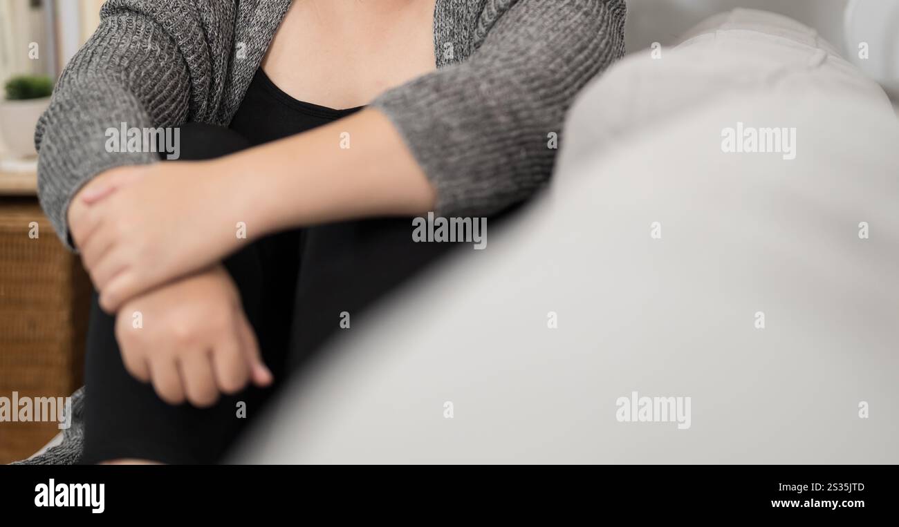 Sad Overweight plus size woman thinking about problems on sofa upset ...