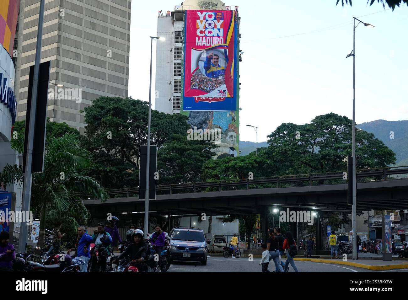 A campaign banner of President Nicolas Maduro adorns a building in ...