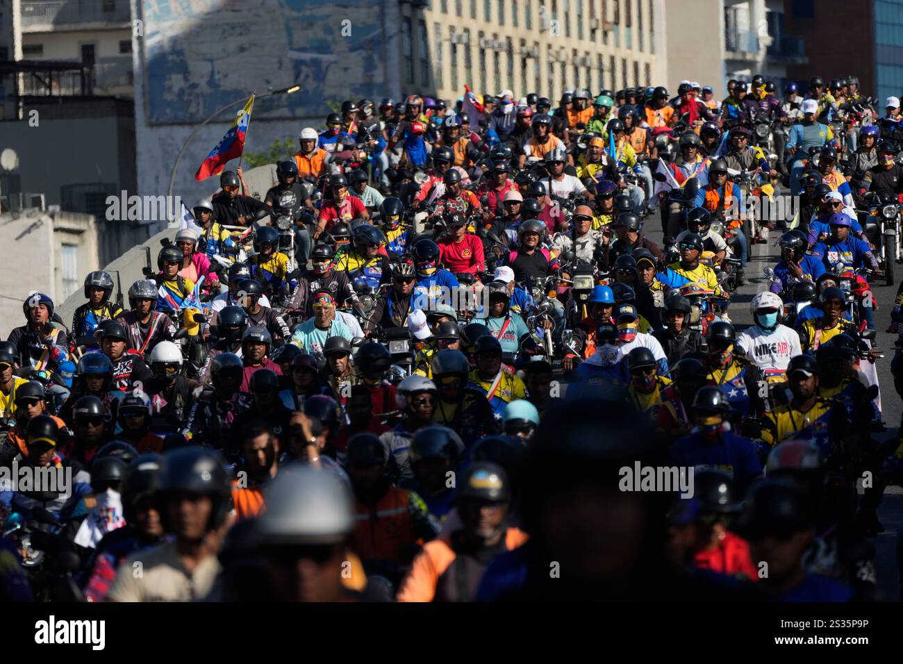 Motorcyclists participate in a rally in support of President Nicolas ...
