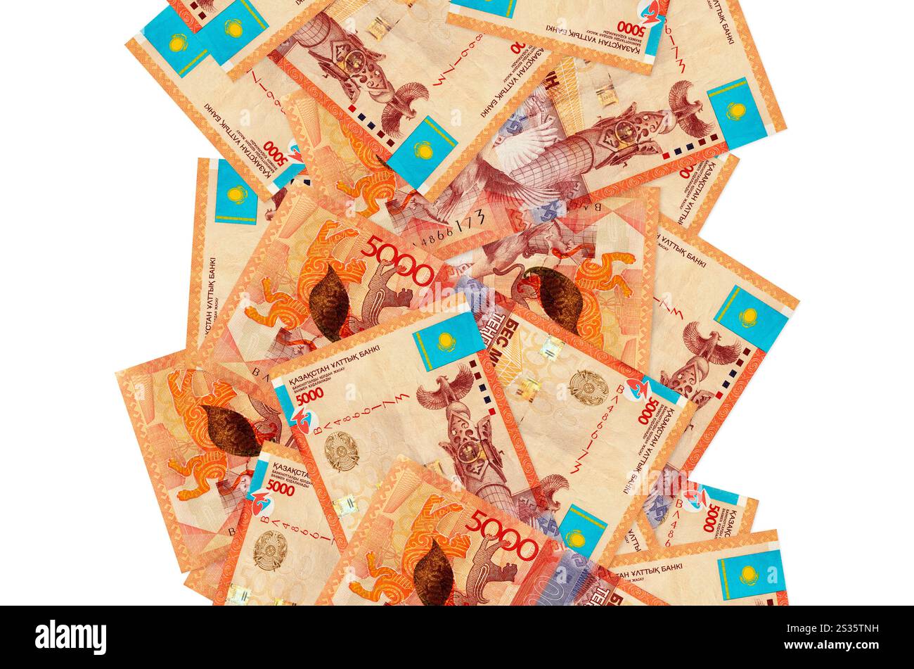 5000 Kazakhstani tenge bills flying down isolated on white. Many ...