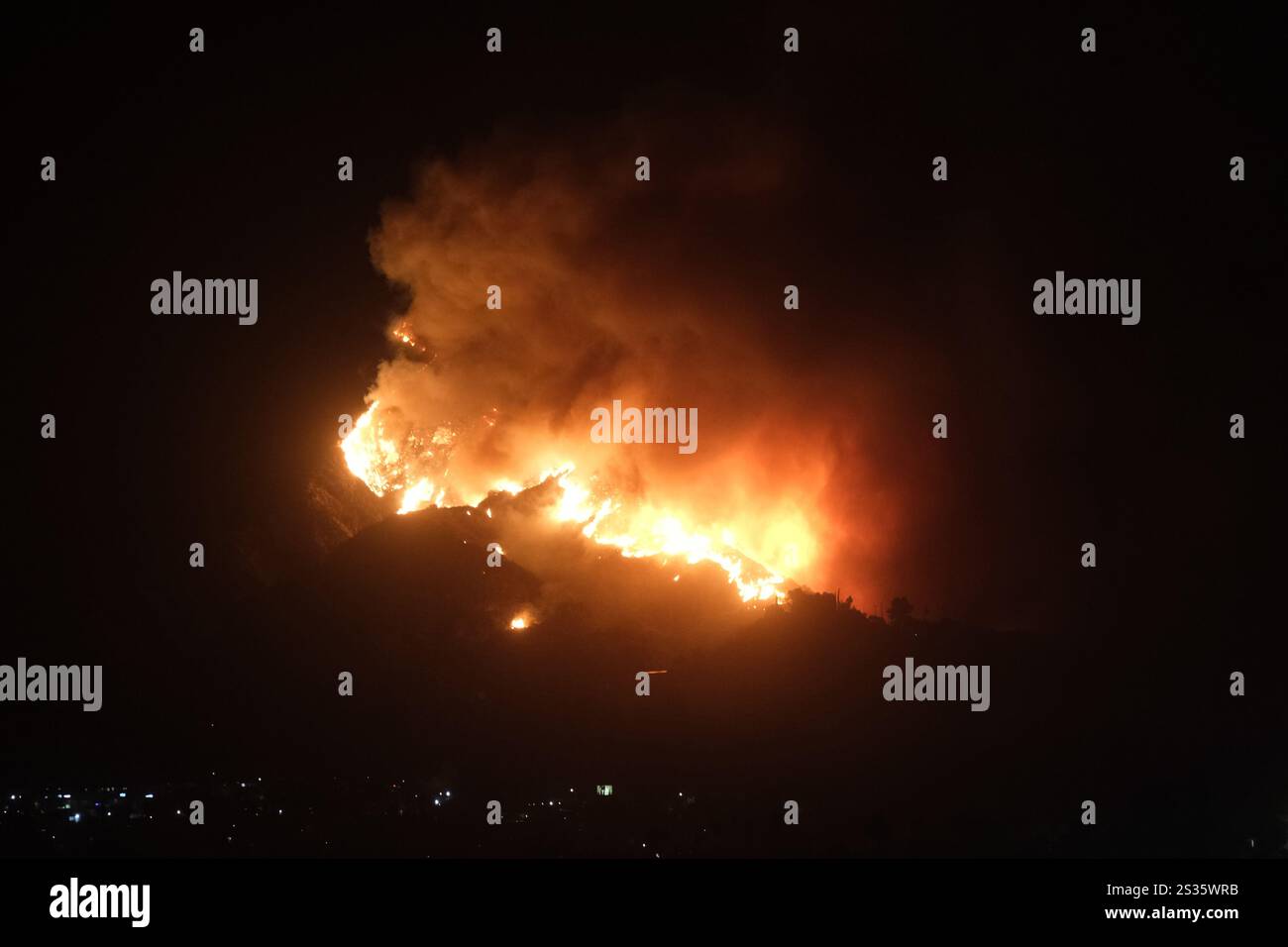 Flames on the mountainside above Altadena California during the Eaton ...