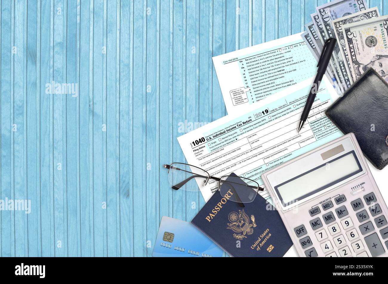 IRS form 1040 Individual income tax return lies on flat lay office ...