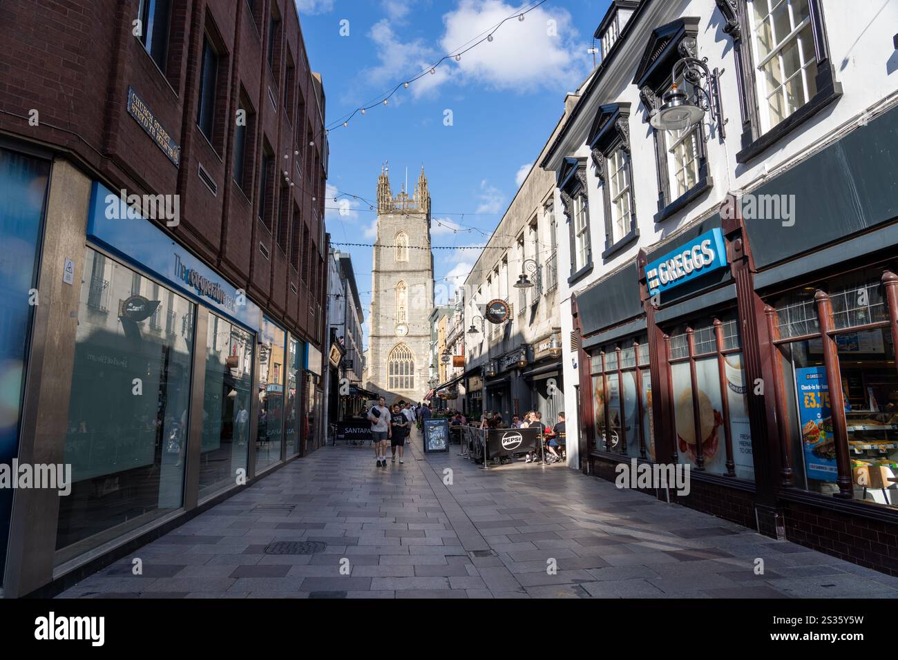 Cardiff Wales - August 6 2024: City street scene Narrow alley with bars ...