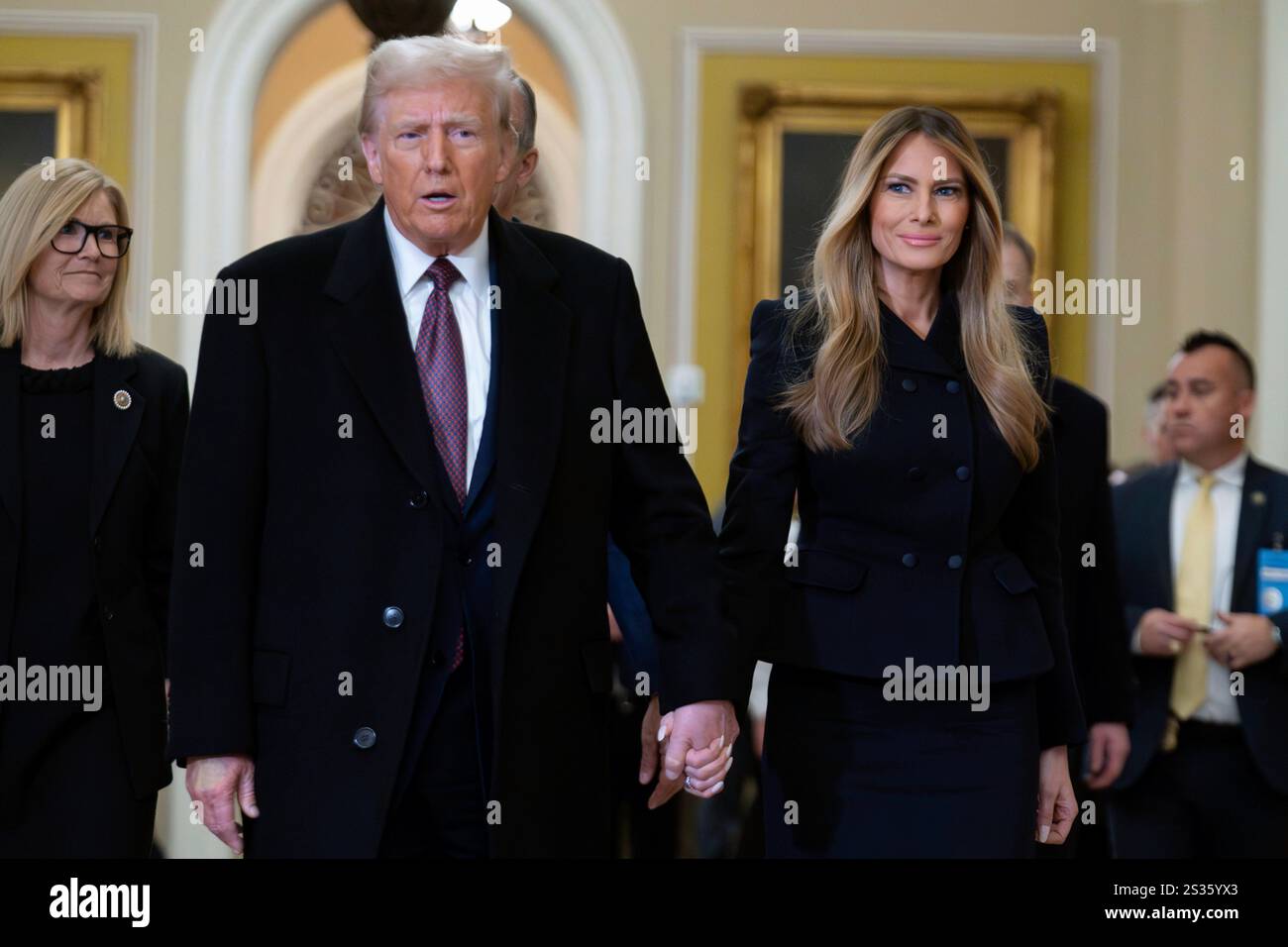 President-elect Donald Trump walks with Melania Trump at the Capitol ...