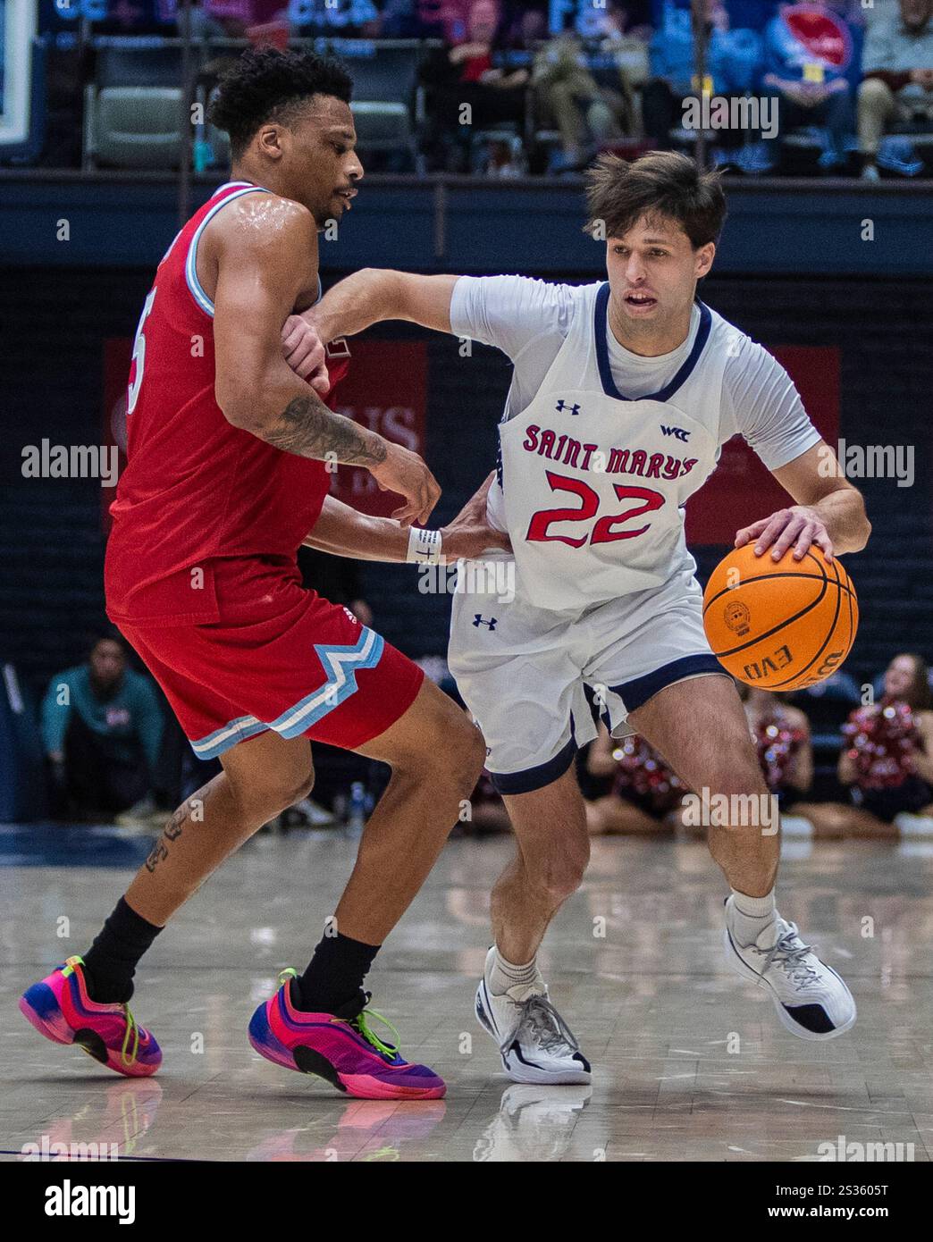 January 07 2025 Moraga CA, U.S.A. Saint Marys guard Cade Bennett (22)goes to the hoop during the ...