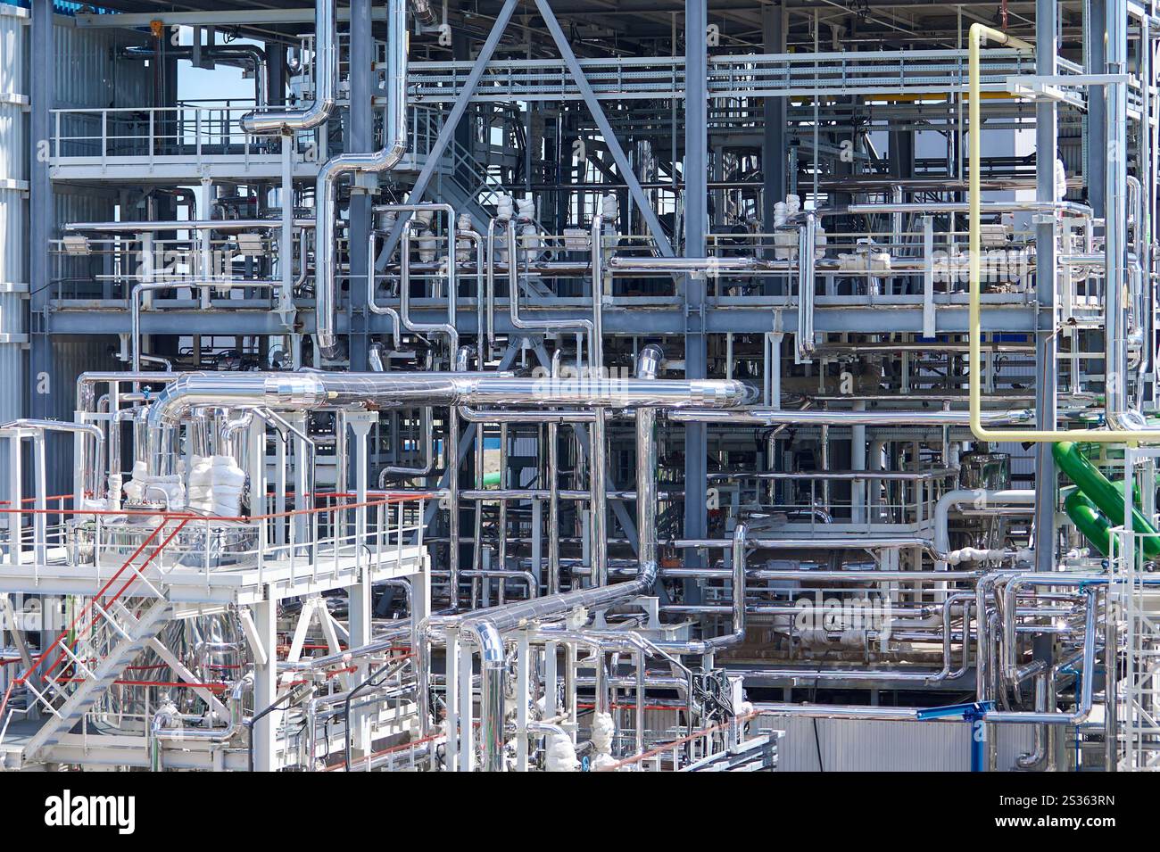 Pipelines and structures of a modern chemical plant during daylight ...