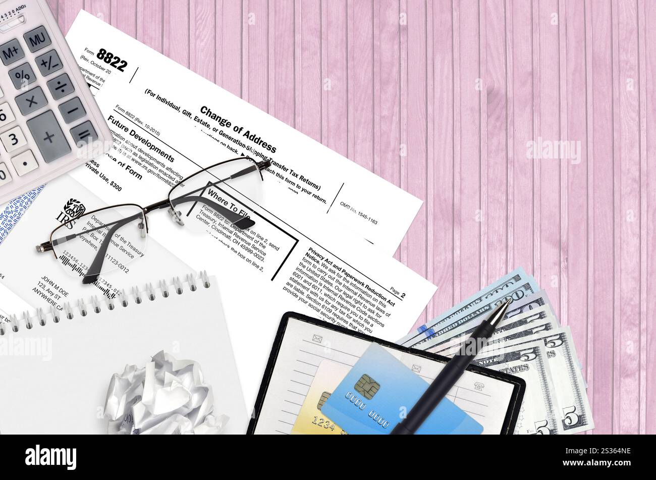 IRS form 8822 Change of Address lies on flat lay office table and ready ...