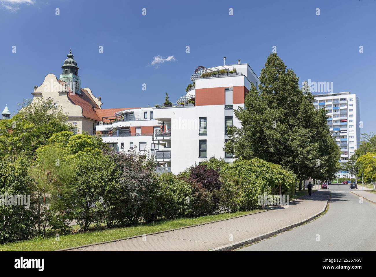 Old and new, historic craftsmen's school, modern apartment block and ...
