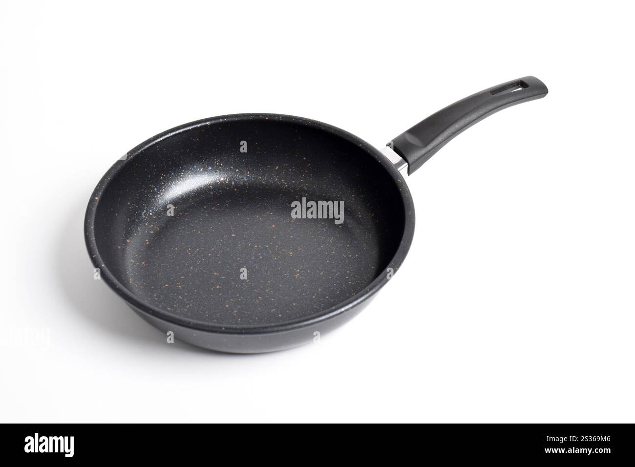 Black frying pan with a non-stick coating isolated on white background ...