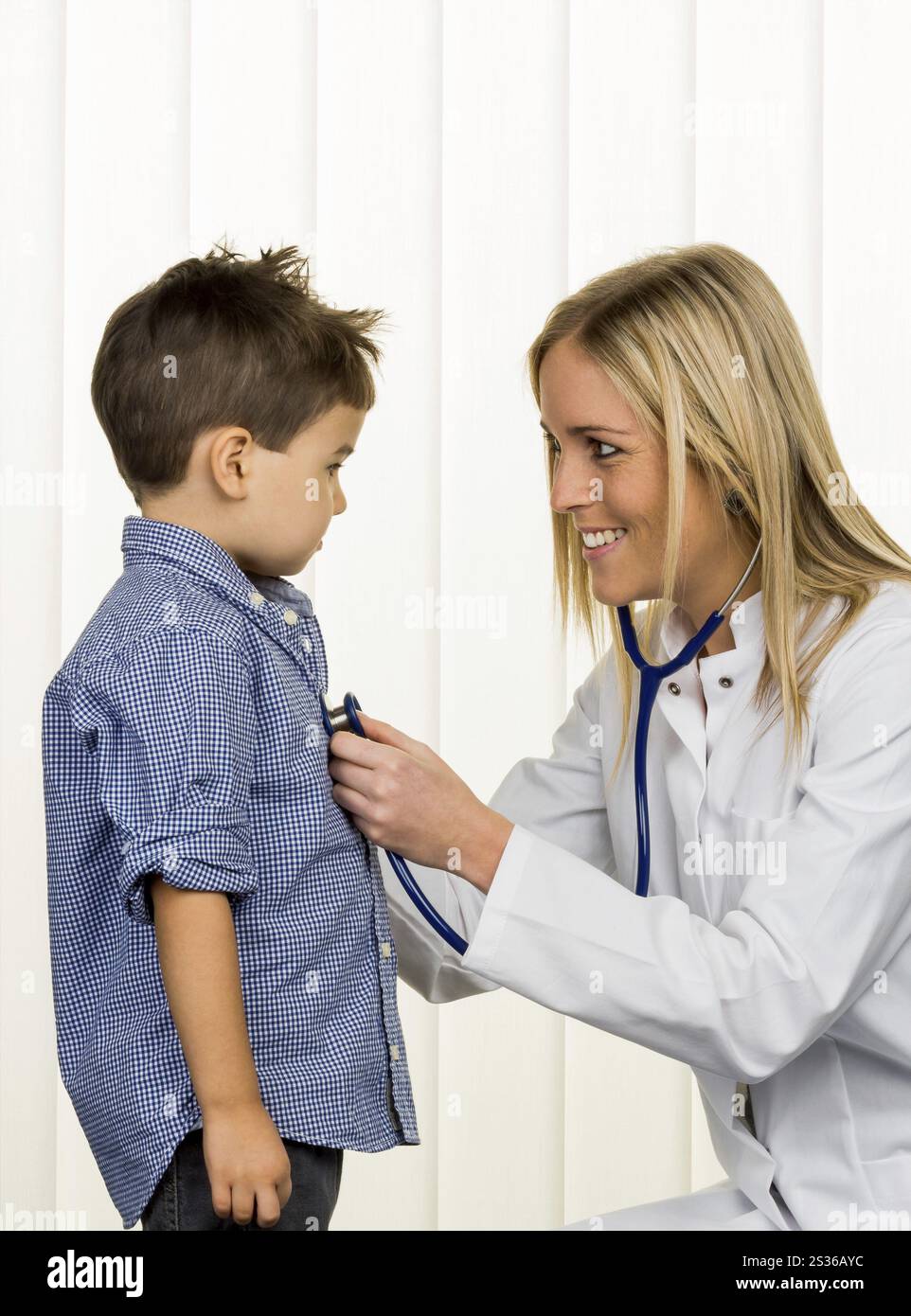 Doctor and little boy, symbol for diseases, diagnostics, heart defects ...