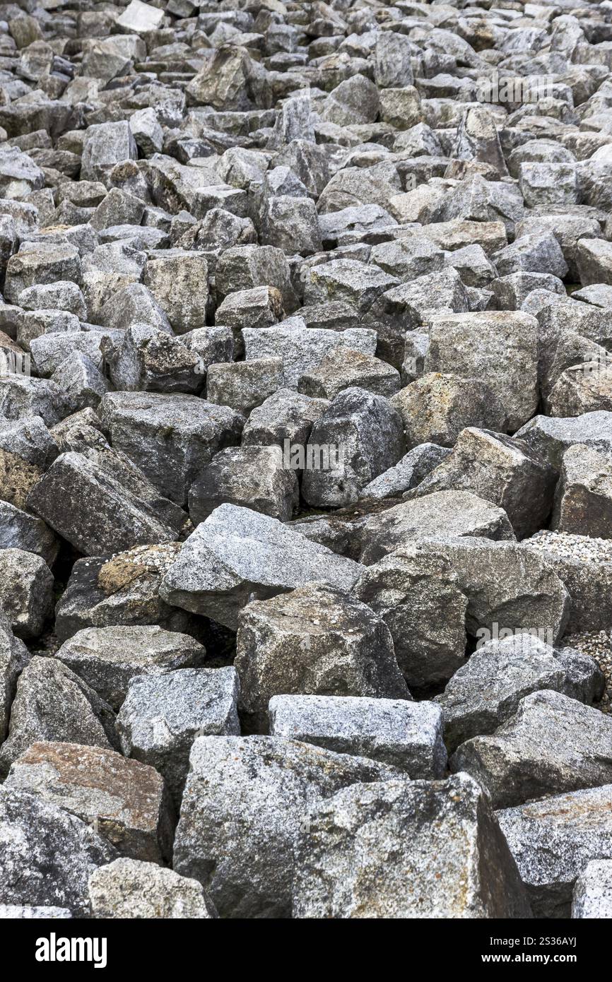 A stack of natural stones lying next to each other. Symbol photo ...