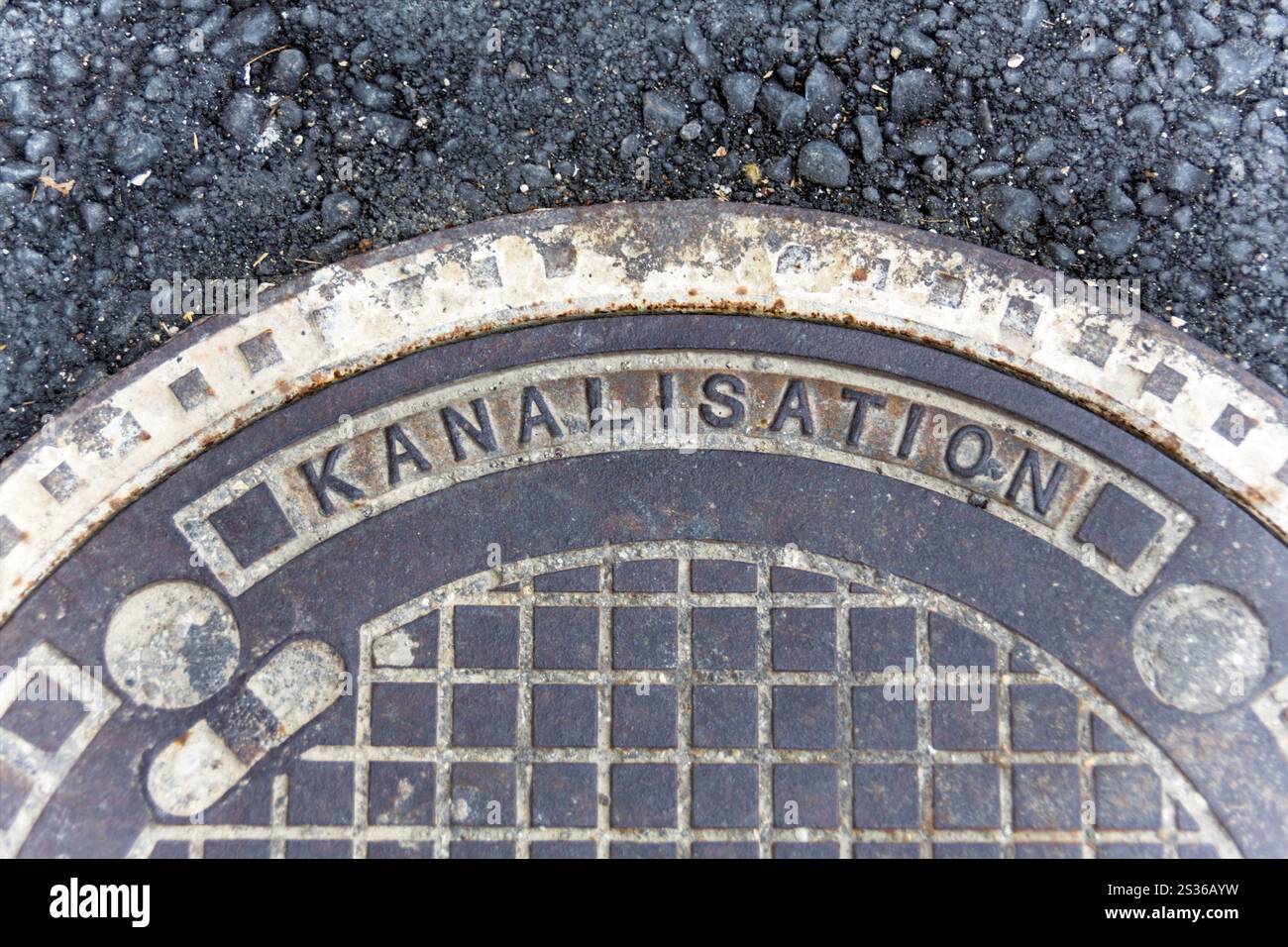 Sewerage system cover, symbolic photo for wastewater disposal and water ...