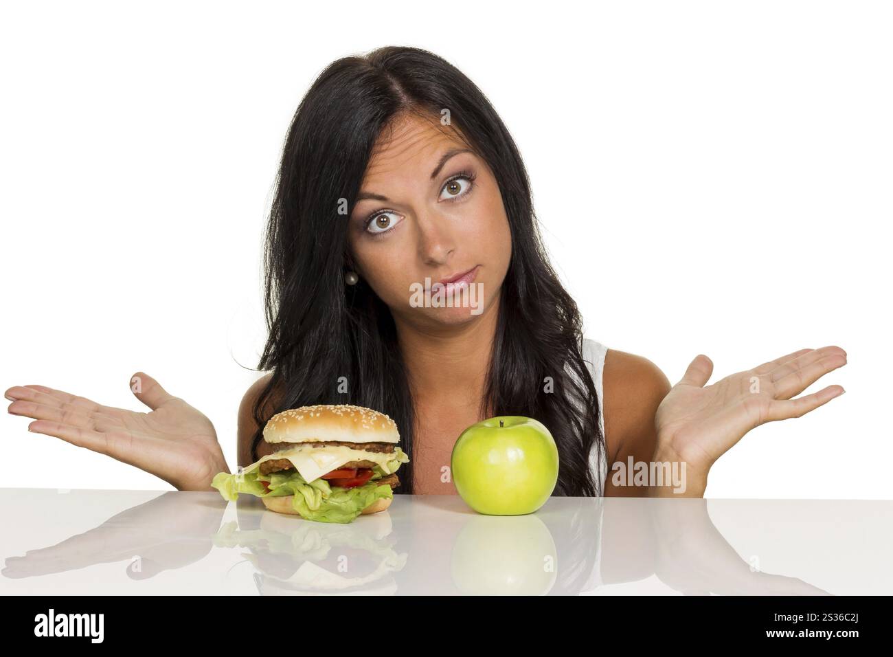 Woman decides eating hamburger hi-res stock photography and images - Alamy