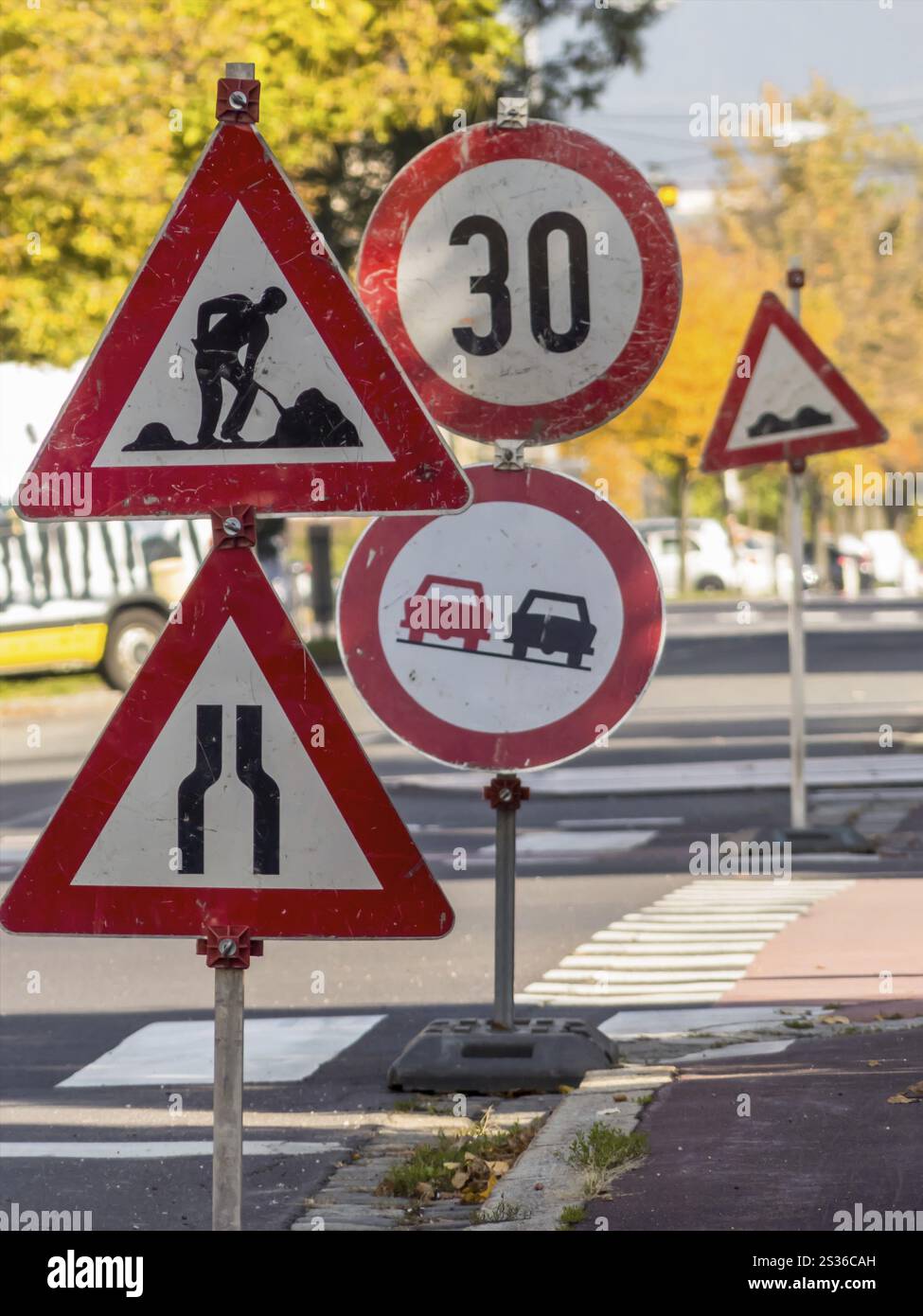 A roadworks site is secured by several traffic signs. Austria Stock ...