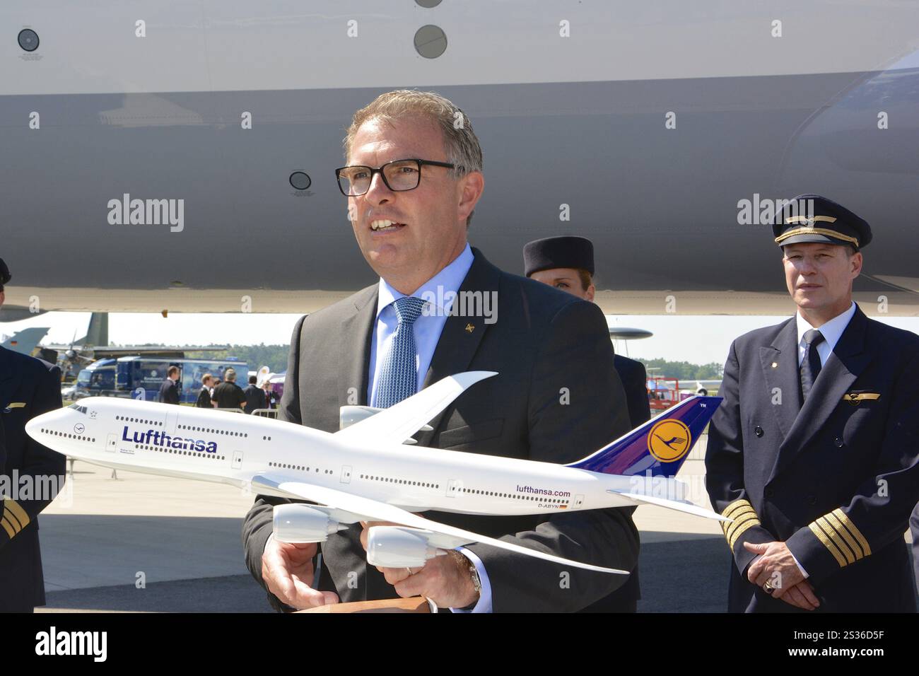 Lufthansa CEO Carsten Spohr with model and pilot Stock Photo - Alamy