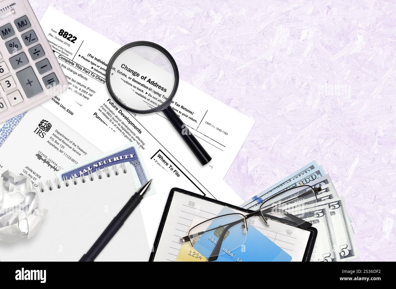 IRS form 8822 Change of Address lies on flat lay office table and ready ...