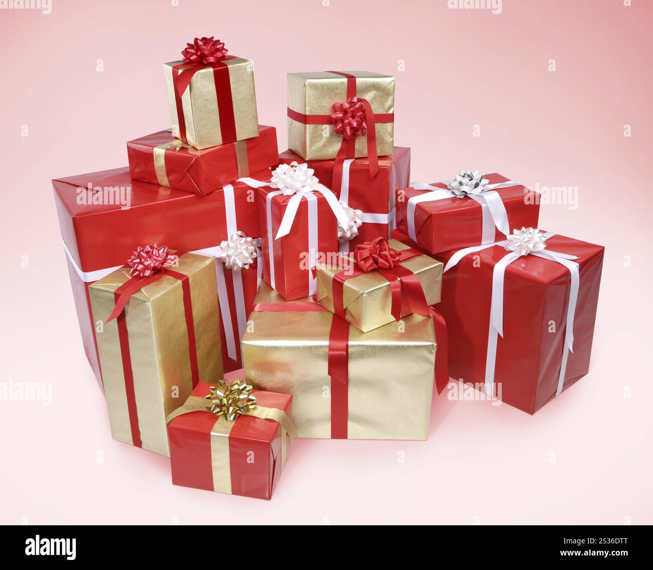 Pile of Christmas gift boxes isolated on pink background with clipping ...