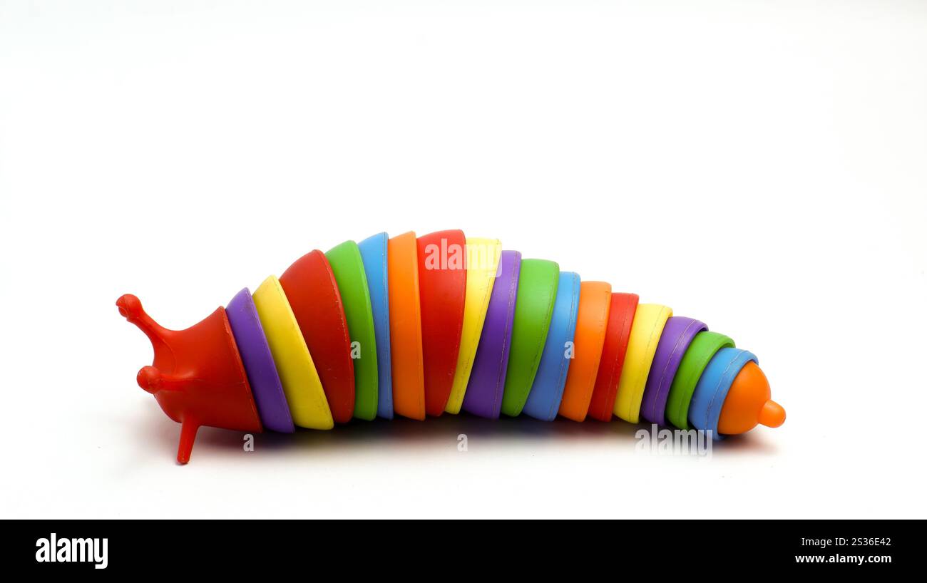 A Children's Toy In The Shape Of A Snail With A White Background ...