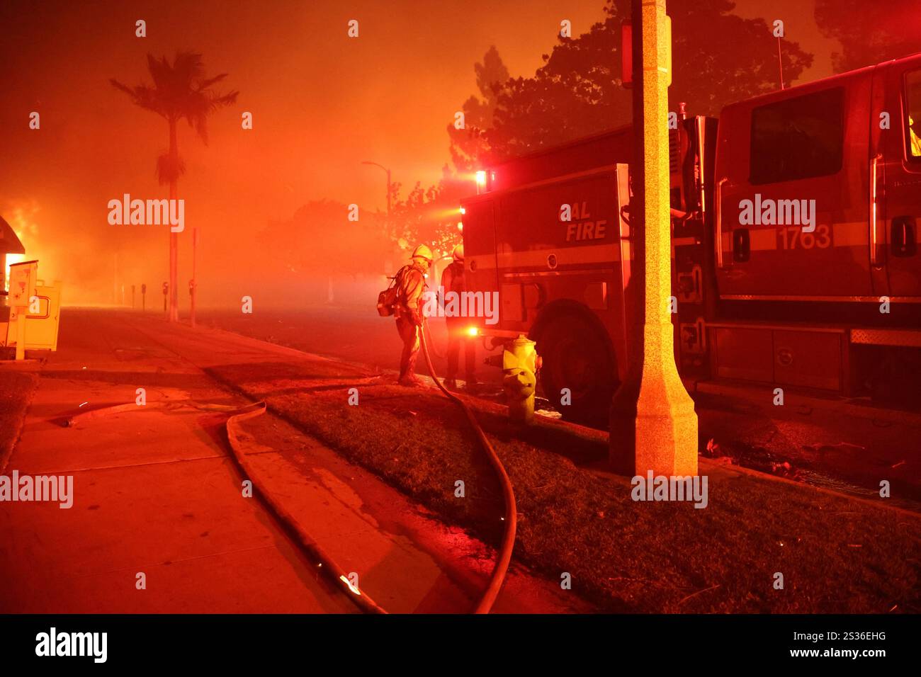CAL FIRE crews working tirelessly to connect hoses and combat the ...
