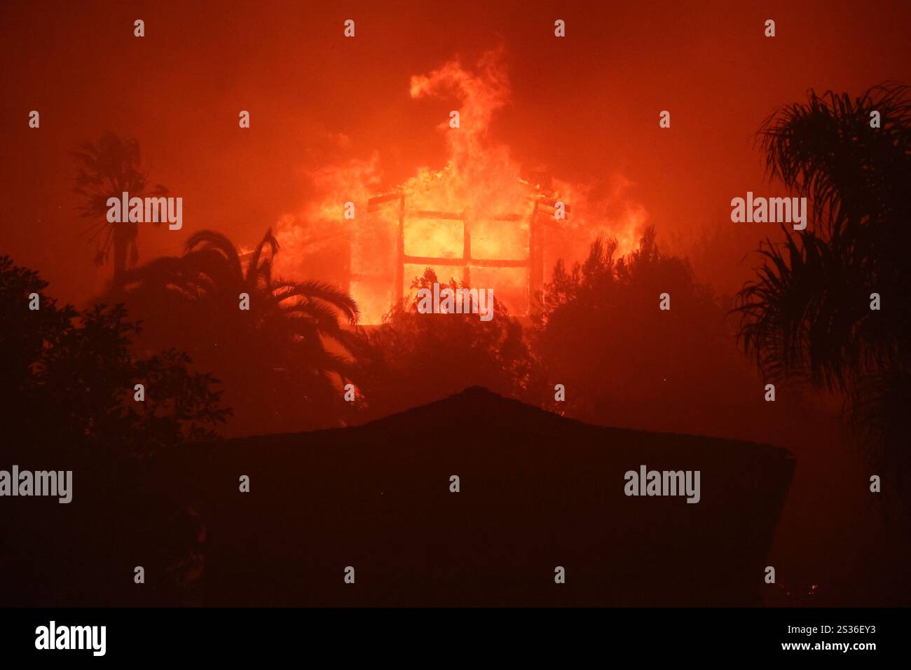 A house completely consumed by fire highlights the destructive force of ...