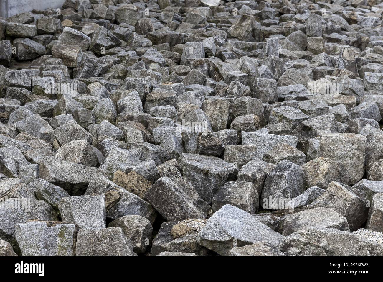 A stack of natural stones lying next to each other. Symbol photo ...