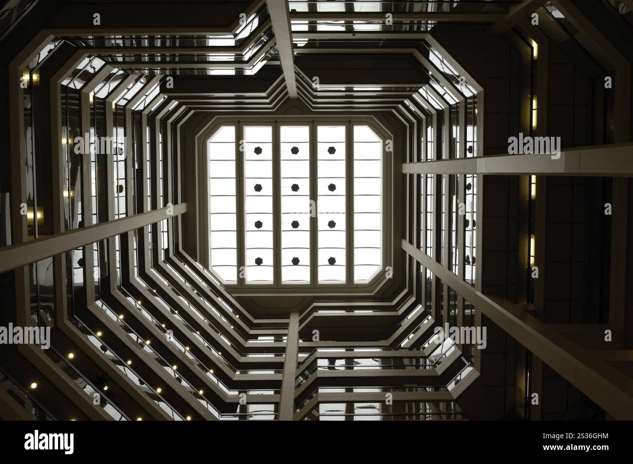 Sunlight coming from a glass ceiling of a high rise building Abstract ...