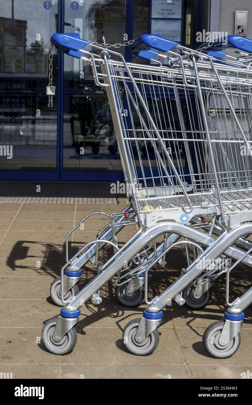 There are shopping trolleys for customers in front of a supermarket in ...