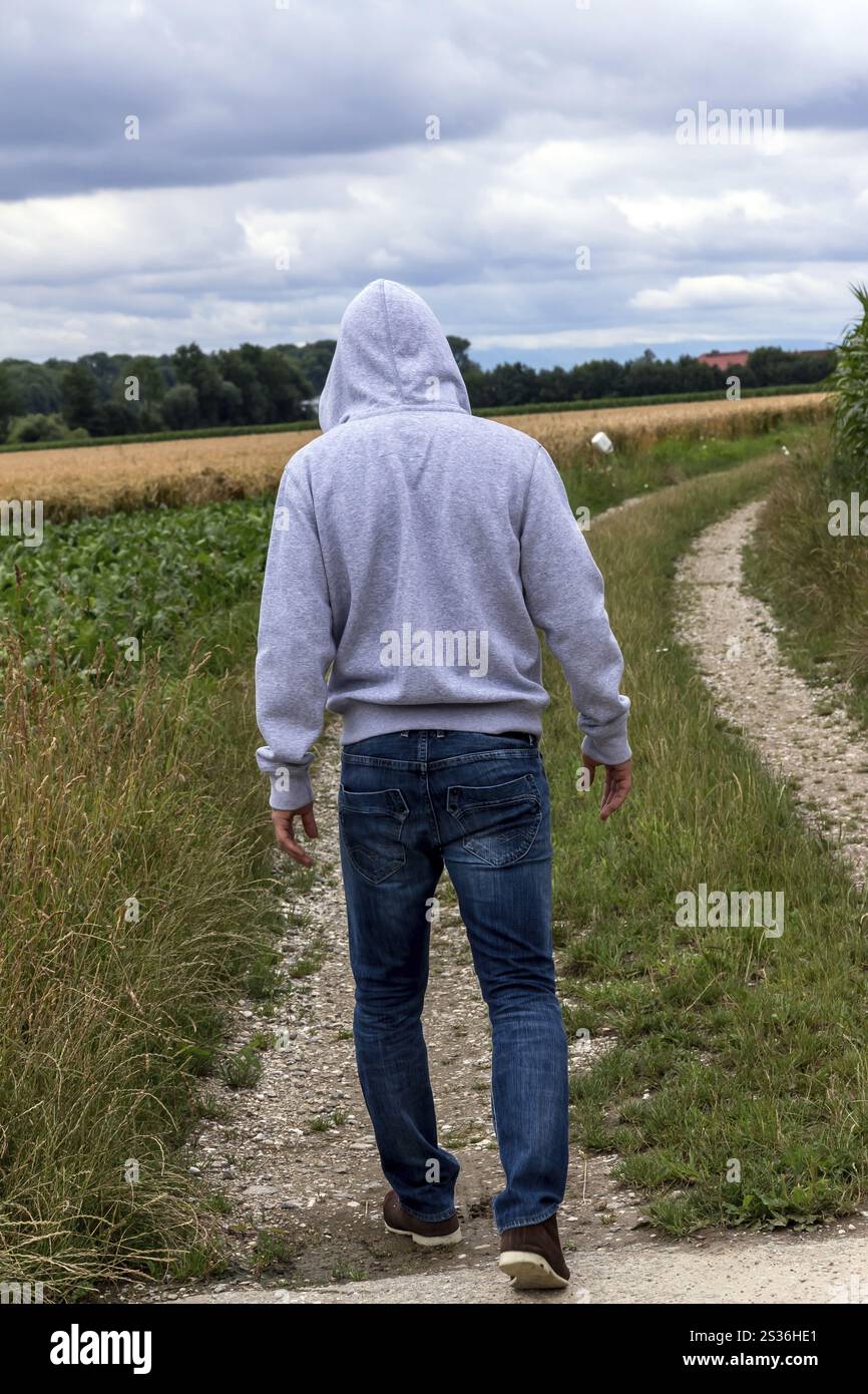 Man walks alone hi-res stock photography and images - Alamy