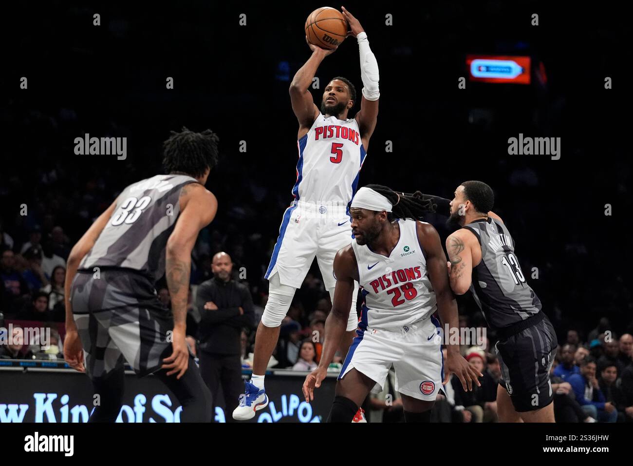 Detroit Pistons' Malik Beasley (5) shoots over Brooklyn Nets' Nic ...