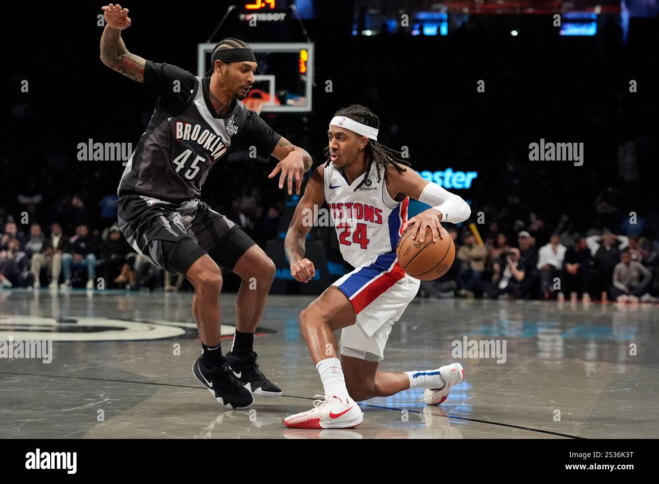 Brooklyn Nets' Keon Johnson (45) defends Detroit Pistons' Daniss ...