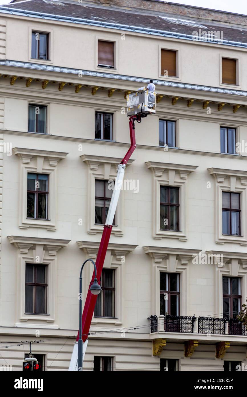 Lifting platform on a residential building, symbol for repair ...
