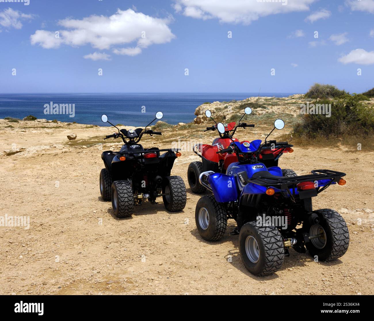 Stock photo of Three PGO X-Rider all-terrain vehicles standing near a ...