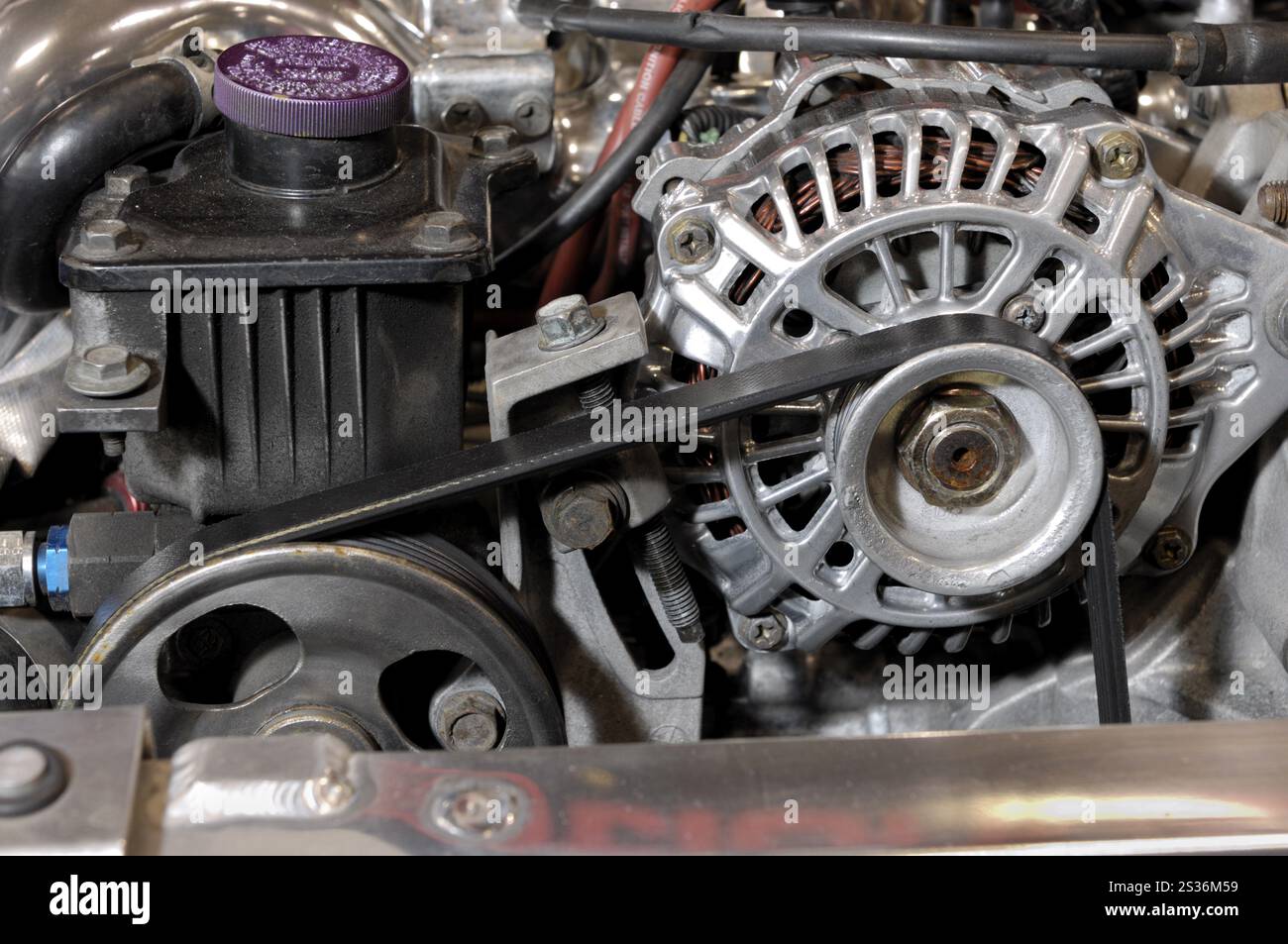 Closeup of a car alternator Stock Photo - Alamy