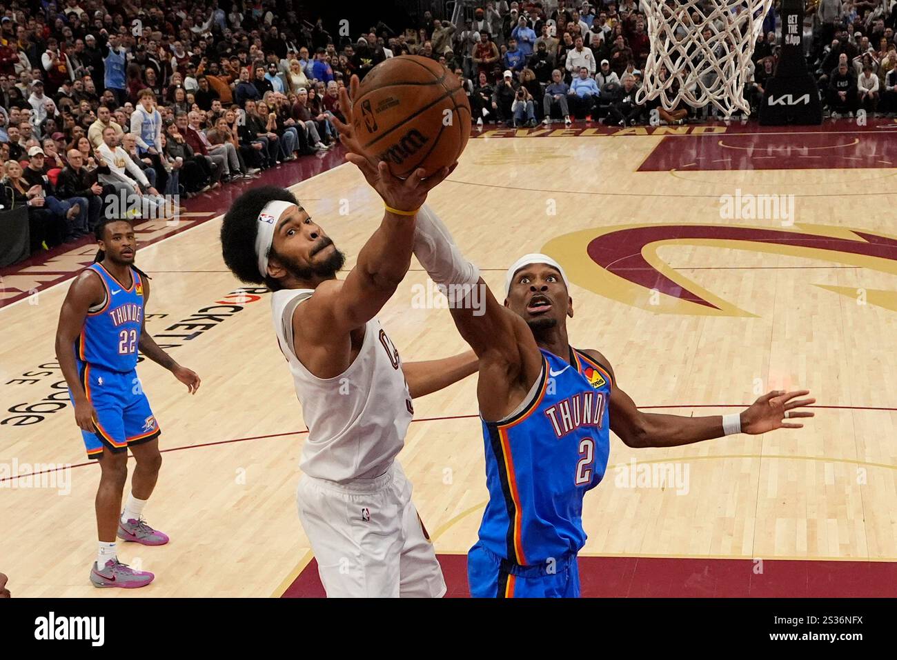 Cleveland Cavaliers center Jarrett Allen (31) reaches for a rebound ...