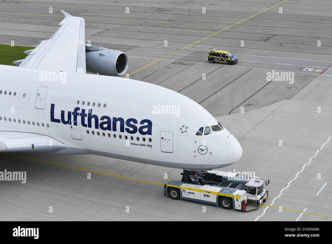 Lufthansa Airbus A380-800 being towed with push back truck on taxiway ...
