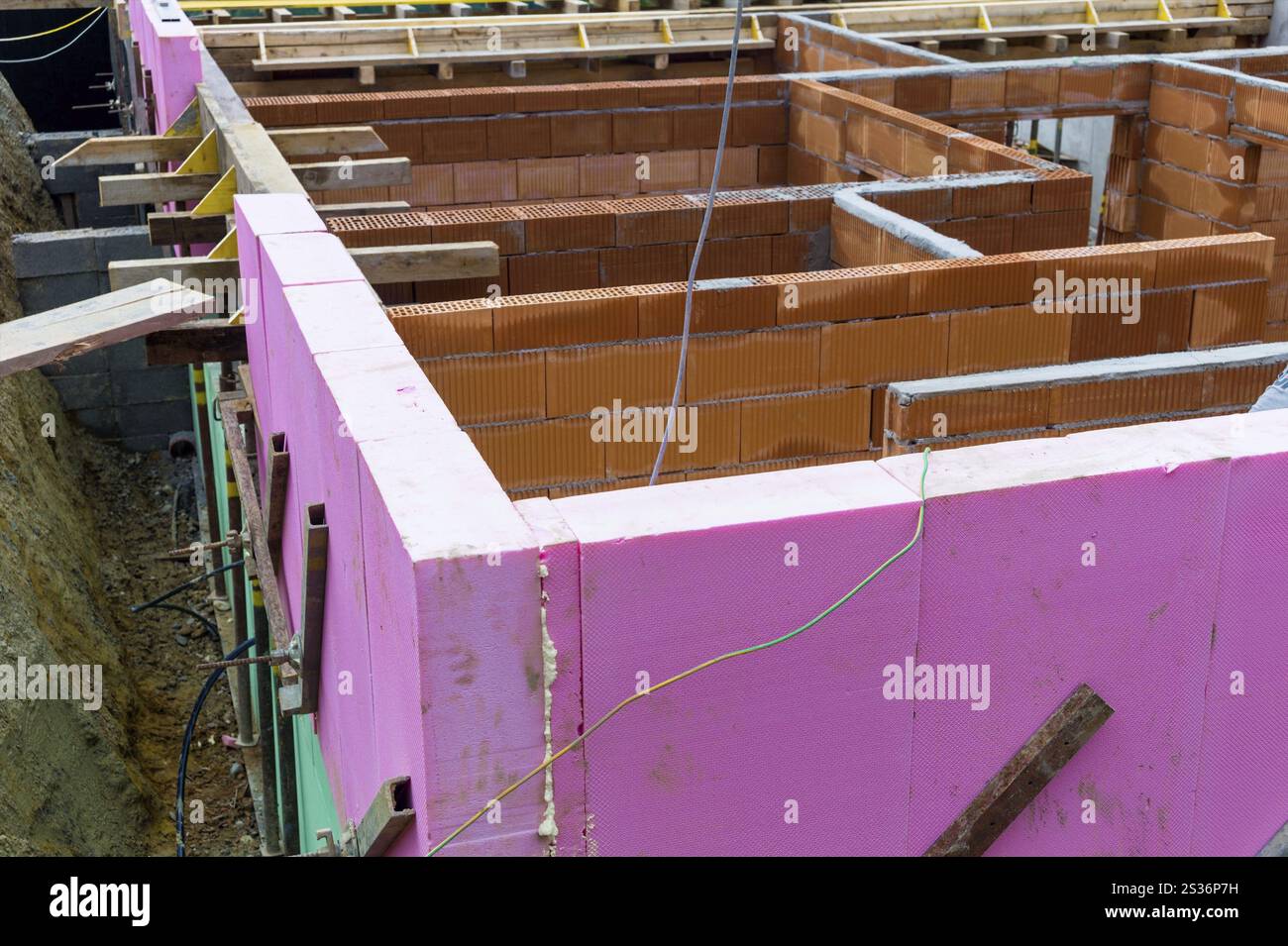 A detached house is built in solid construction with bricks. Thermal ...