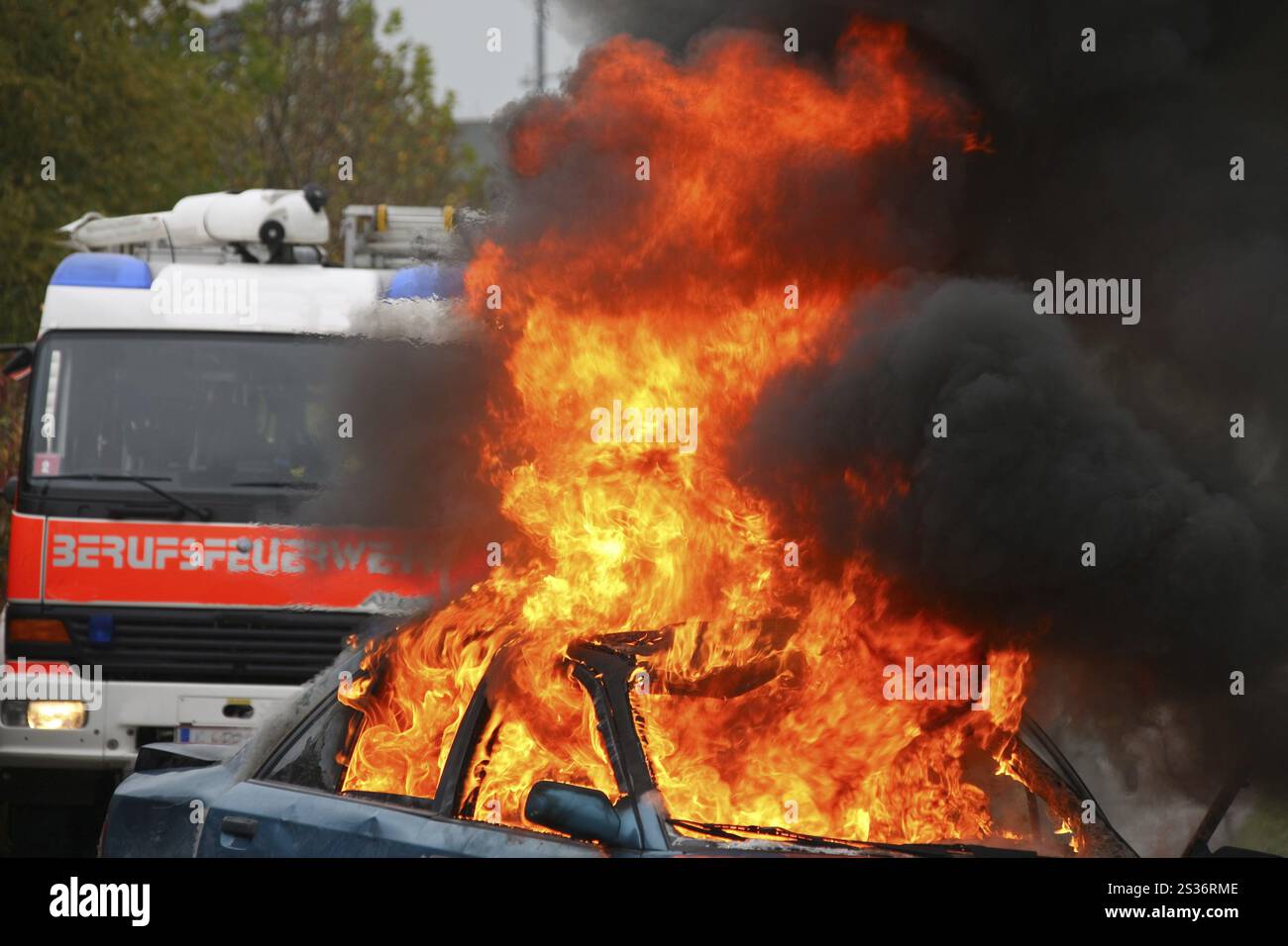 Rescue and fire brigade exercise during car accident Stock Photo - Alamy