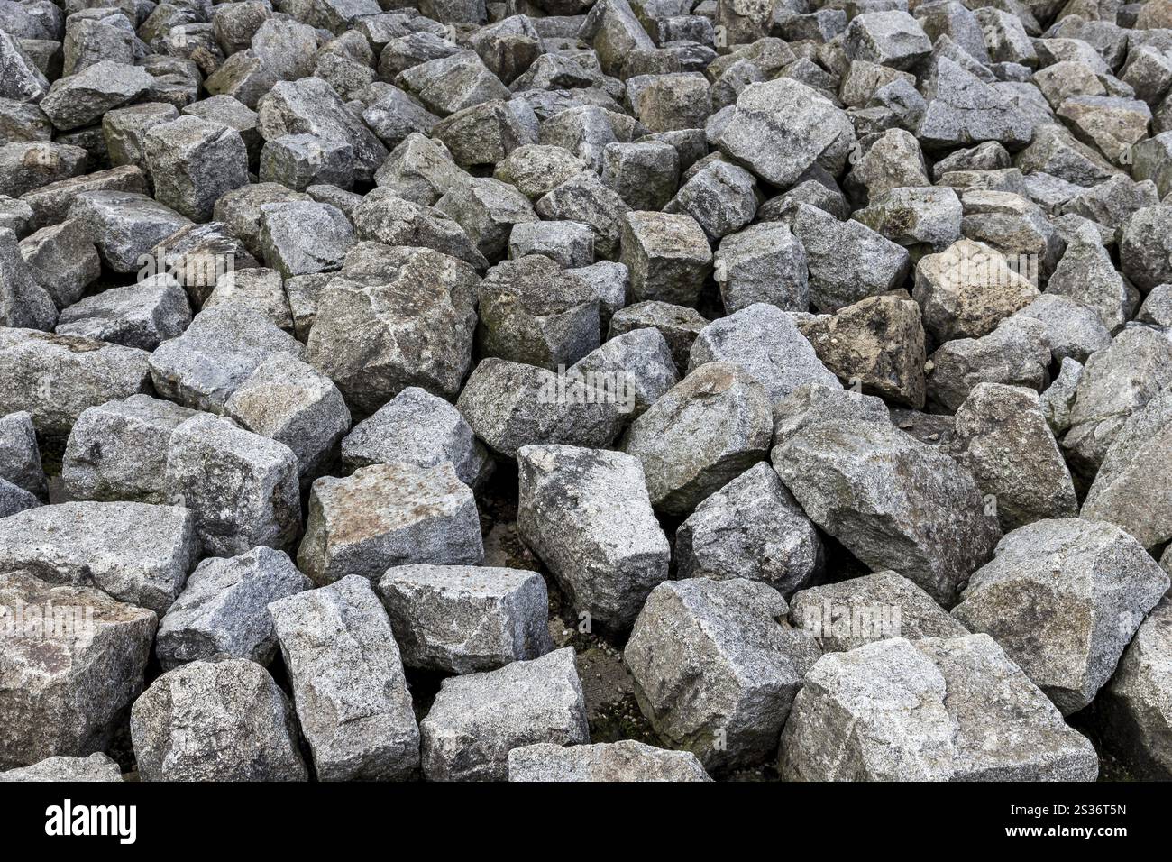 A stack of natural stones lying next to each other. Symbol photo ...