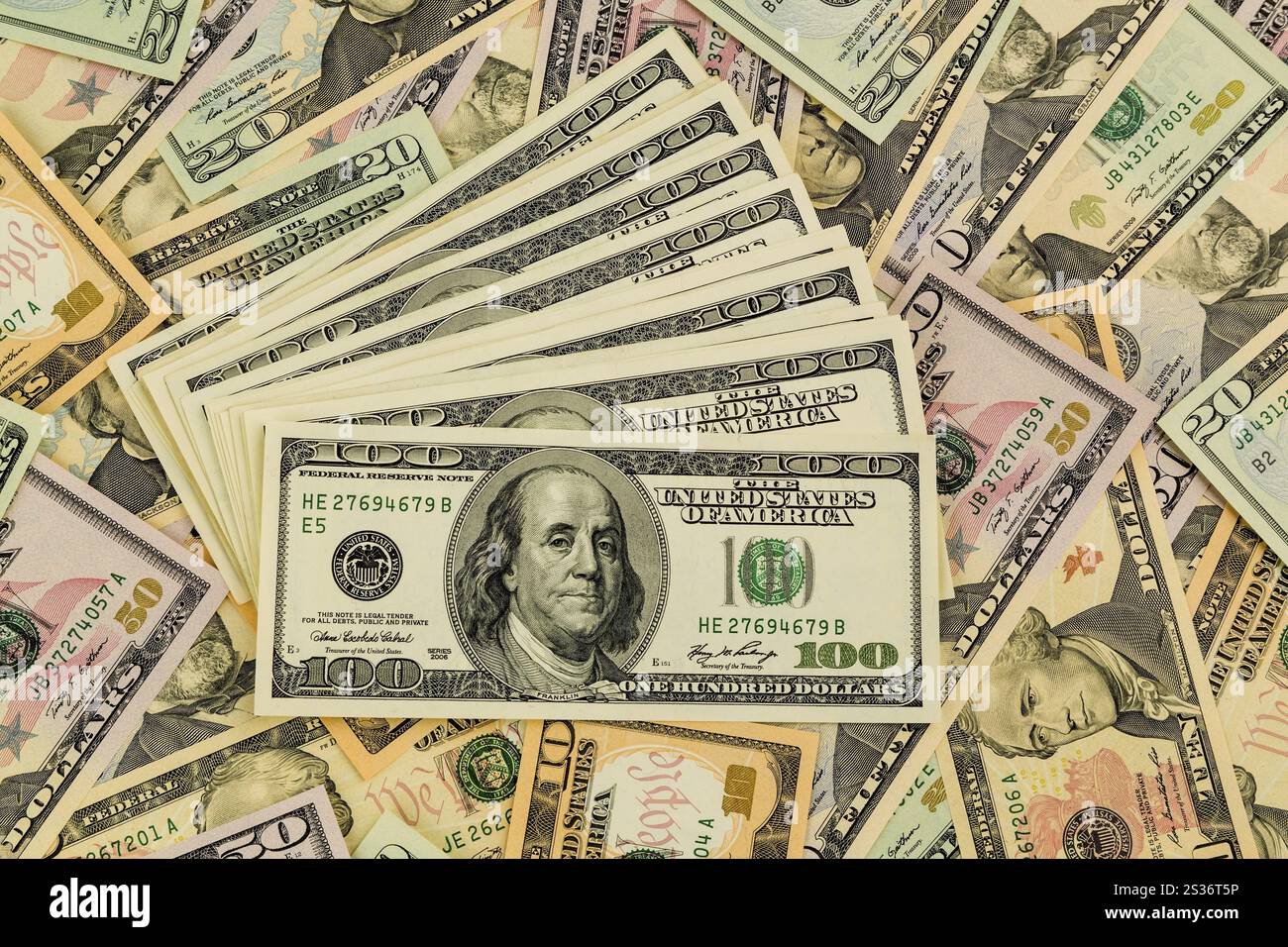 Many American dollar banknotes. Symbolic photo for debt and wealth ...