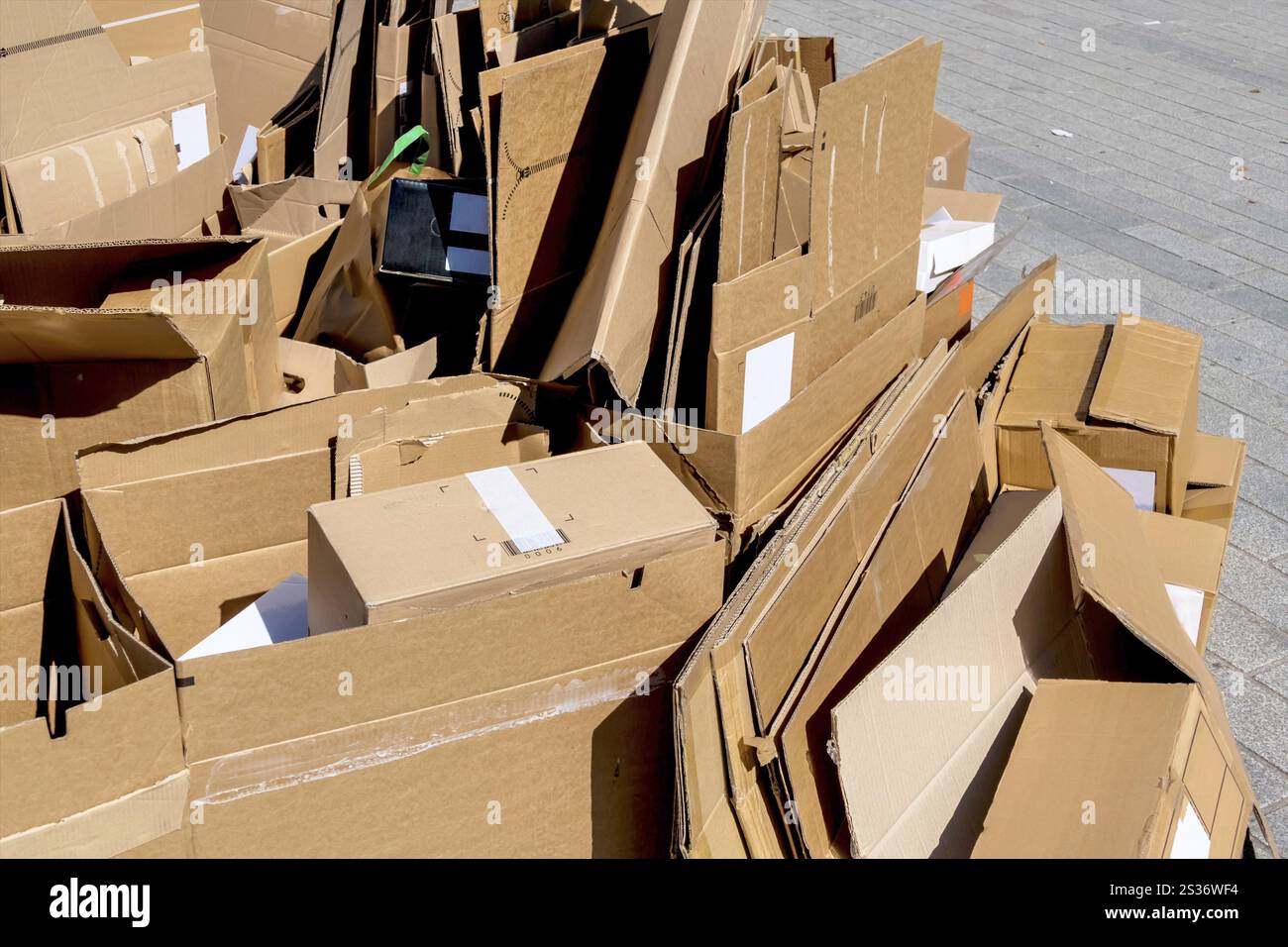 Cardboard boxes waiting to be collected by the waste collection service ...